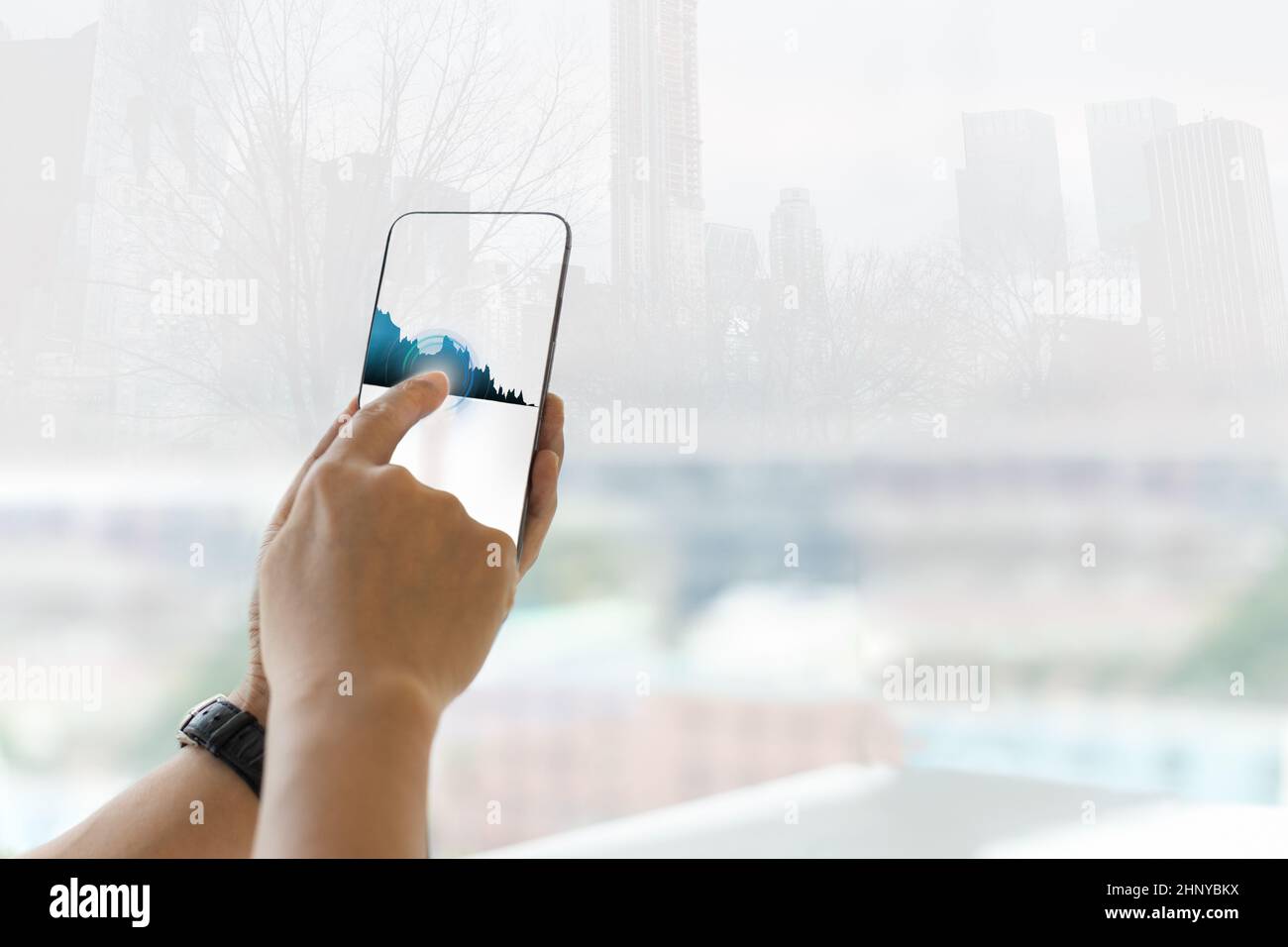 Double exposure business man using cell phone with buildings technology ...