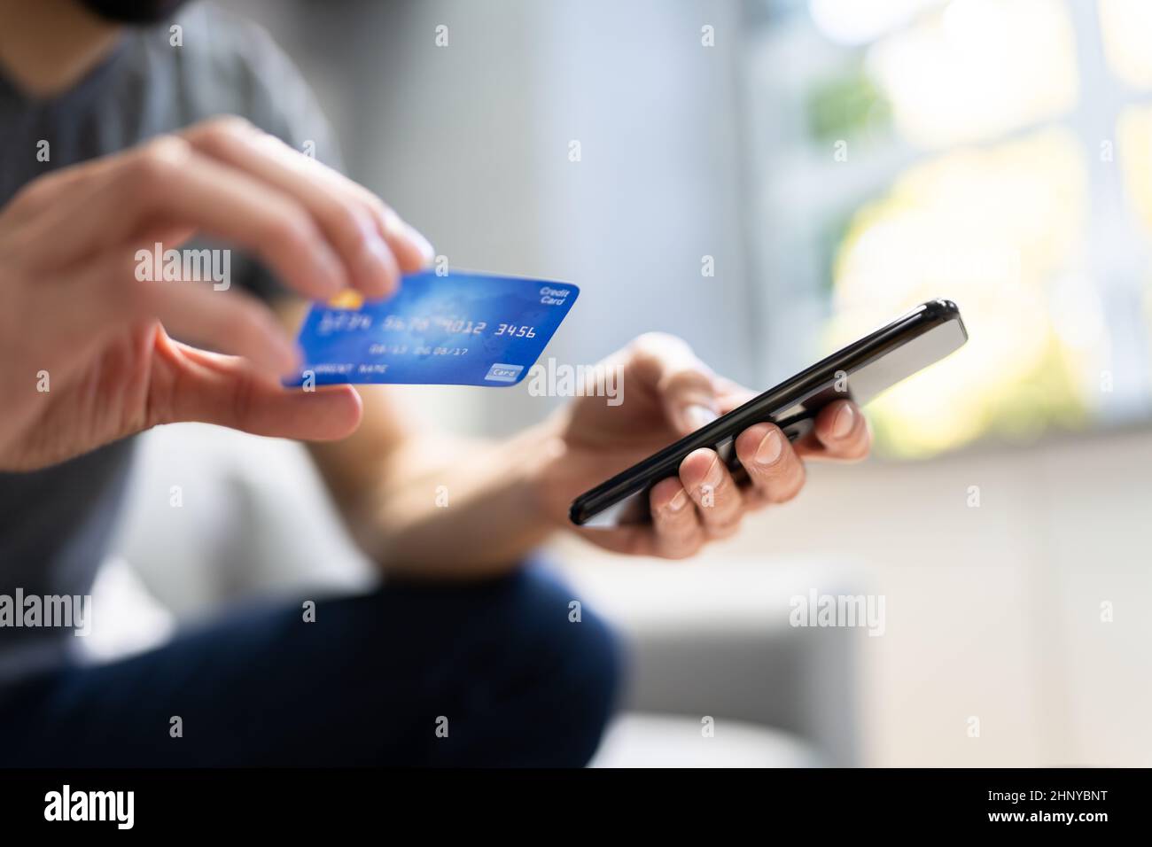 Online Shopping Payment On Mobile Phone Using Credit Card Stock Photo ...