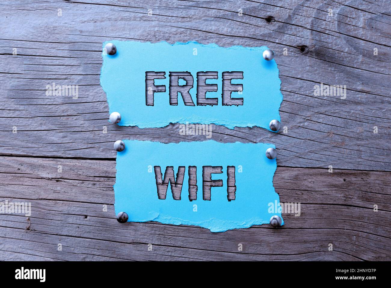 Hand writing sign Free Wifi, Business concept let you connect to the ...