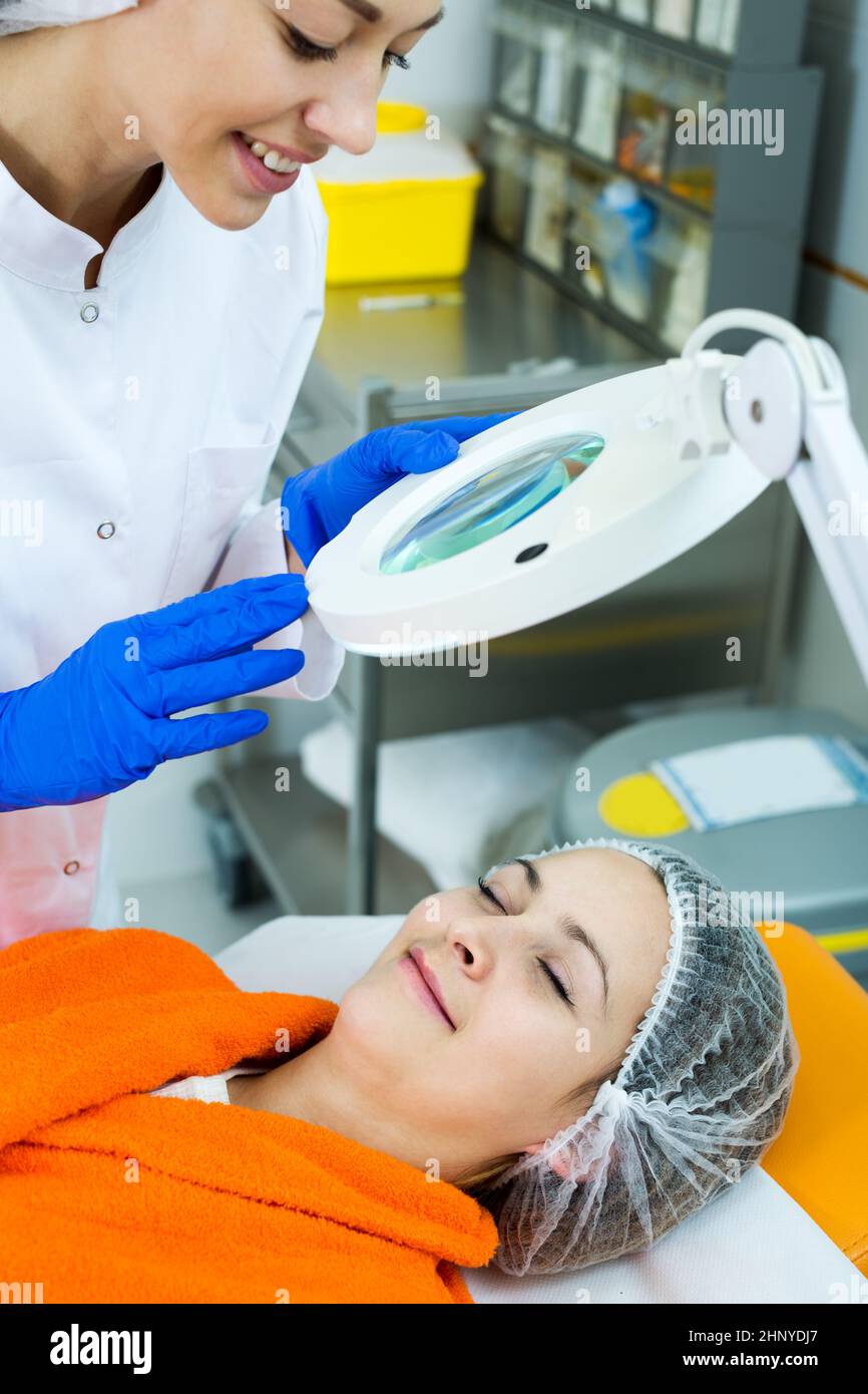 Young client ready for beauty procedures Stock Photo - Alamy