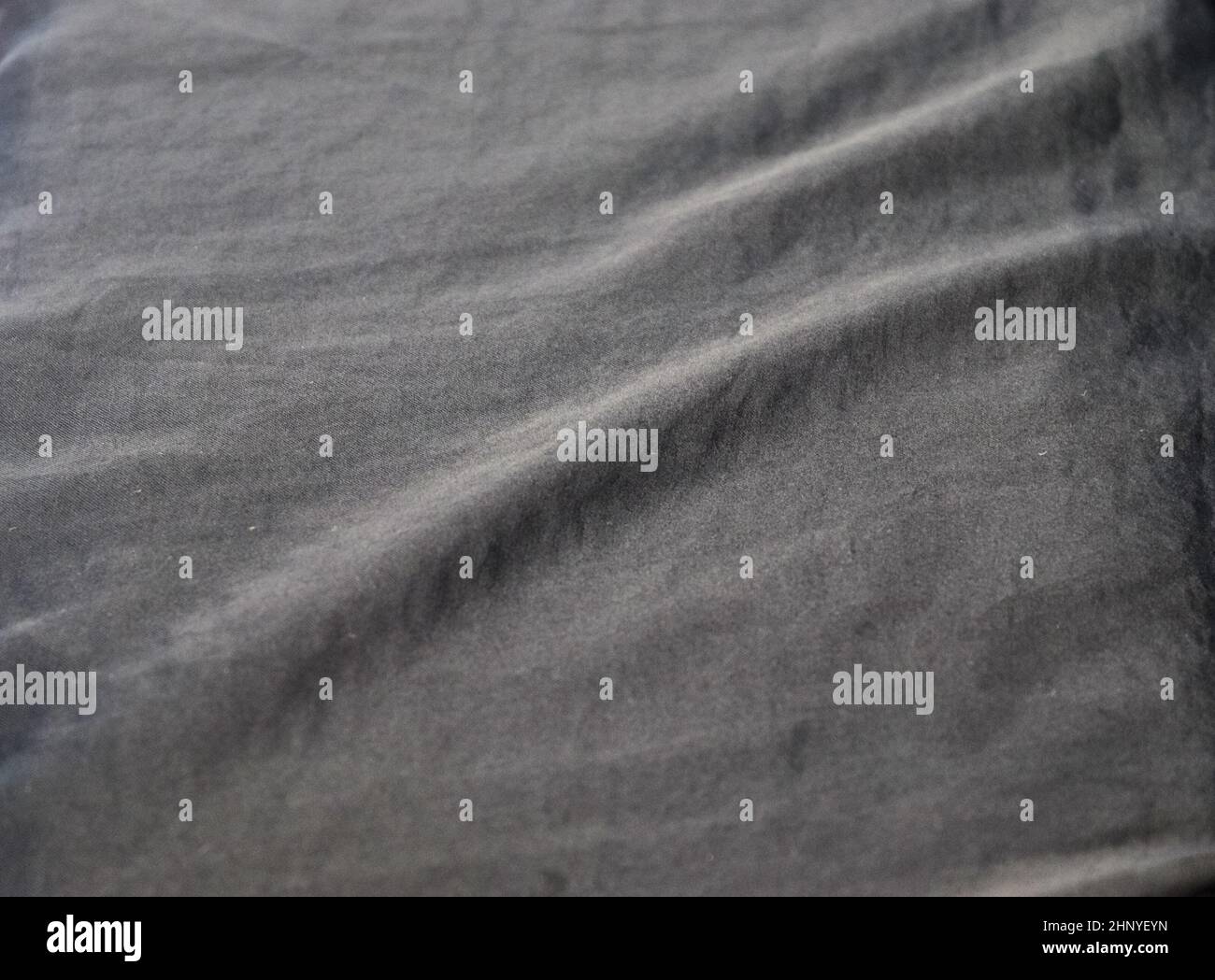 Detailed close up view on samples of cloth and fabrics in different ...