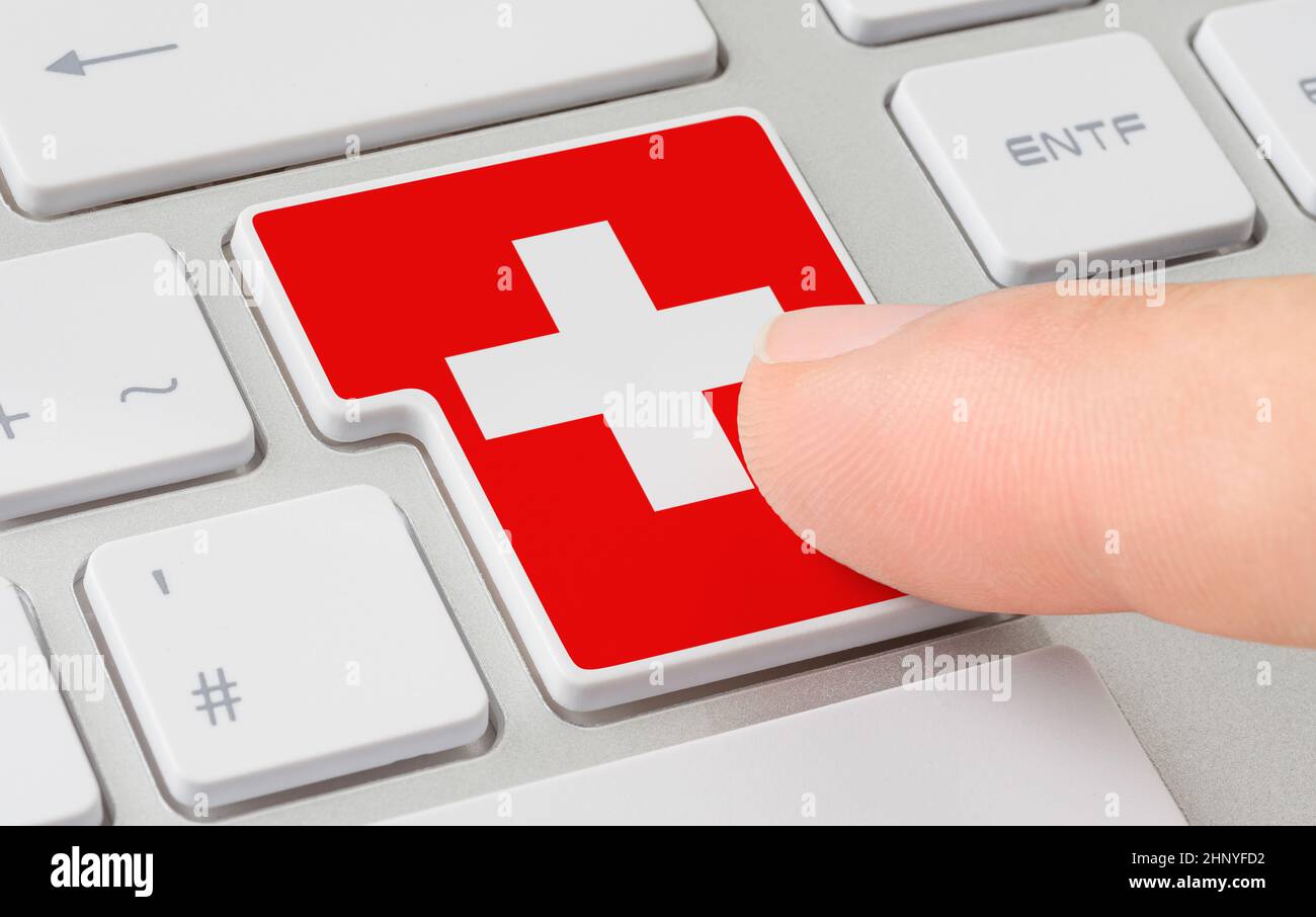 A keyboard with a labeled button - Flag of Switzerland Stock Photo - Alamy