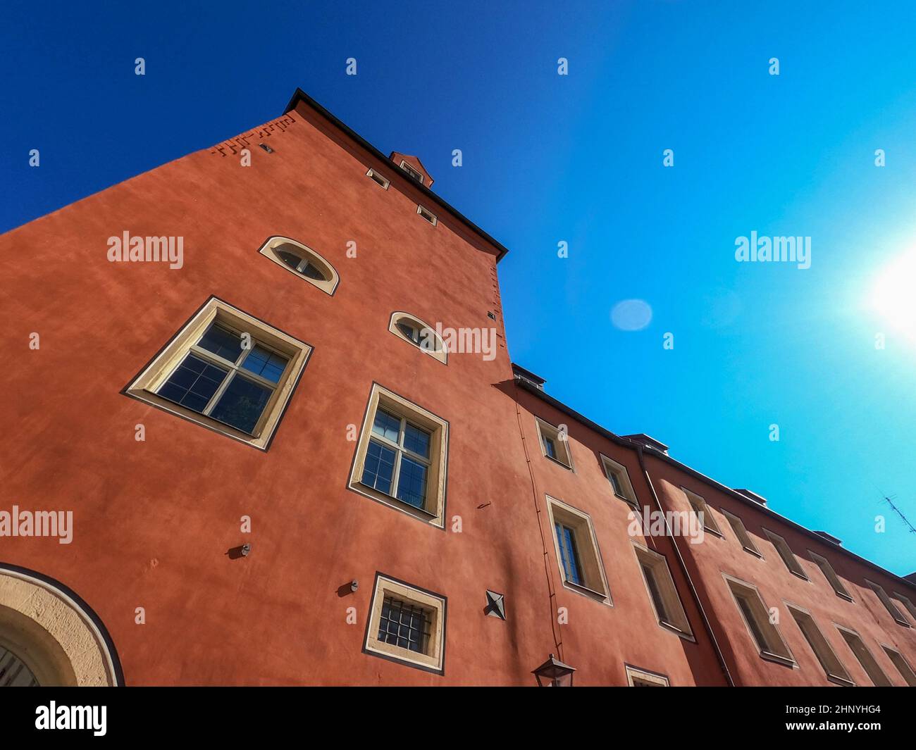 Regensburg photographed with wide angle with stone bridge over the Danube and cathedral and ...