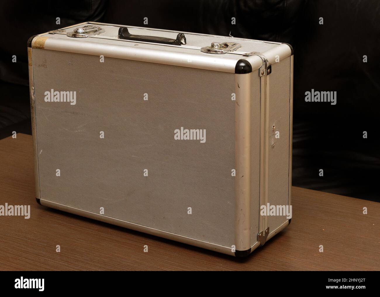 Old closed metal traveling bag ruined from excessive use in aero ...