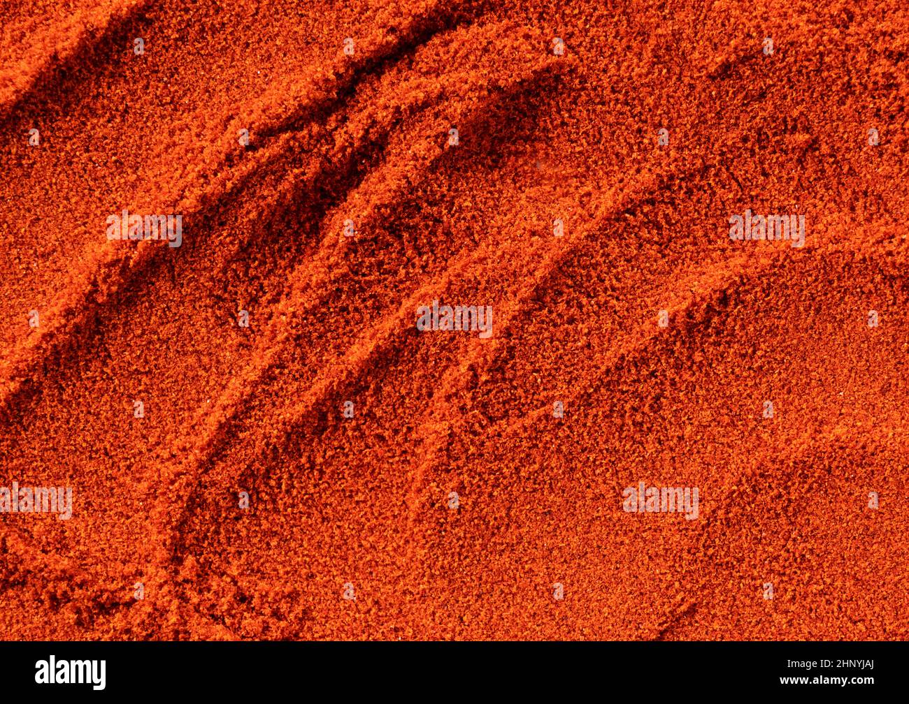 Red pepper powder all over the screen. Cayenne pepper. Paprika powder ...