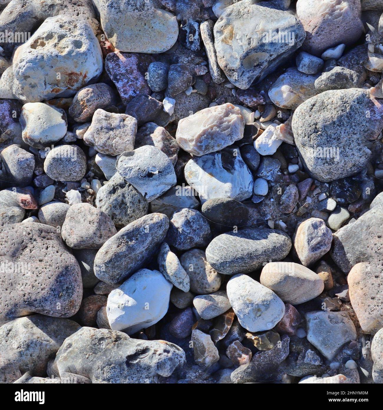 Photo realistic seamless texture pattern of pebbles and stones at a ...