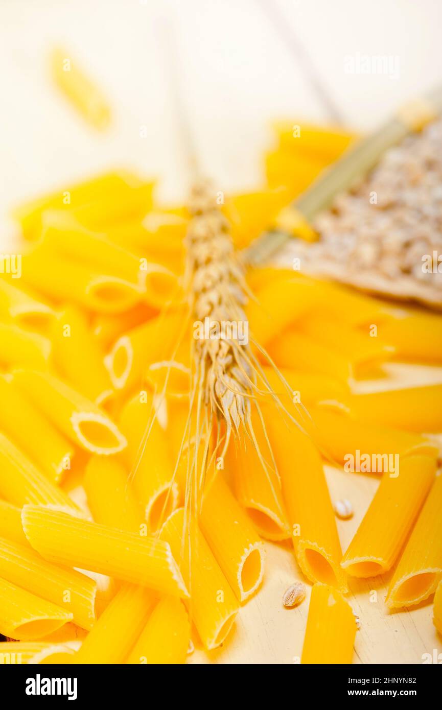 short Italian pasta penne with durum wheat grains Stock Photo - Alamy