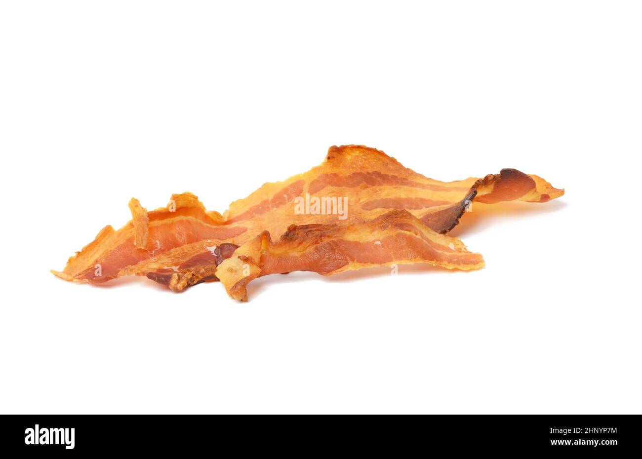 long fried strip of bacon isolated on white background Stock Photo - Alamy