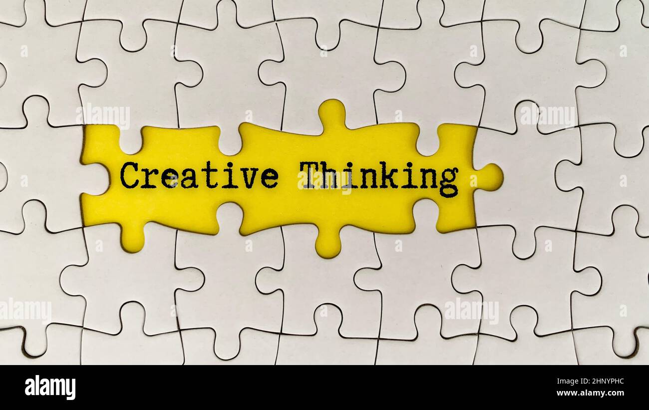 Jigsaw puzzle with words - Creative thinking. Conceptual Stock Photo ...
