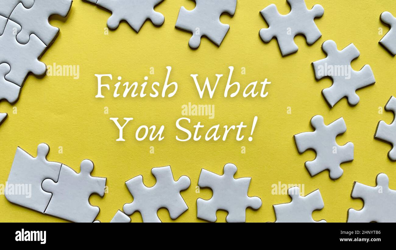 Finish what you start text on yellow background with white jigsaw ...