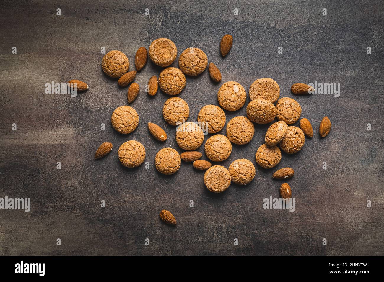 Amaretti biscuits. Sweet italian almond cookies on kitchen table Stock ...
