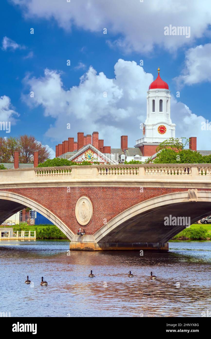 Vintage Bridge with clock tower over Charles River Boston ...
