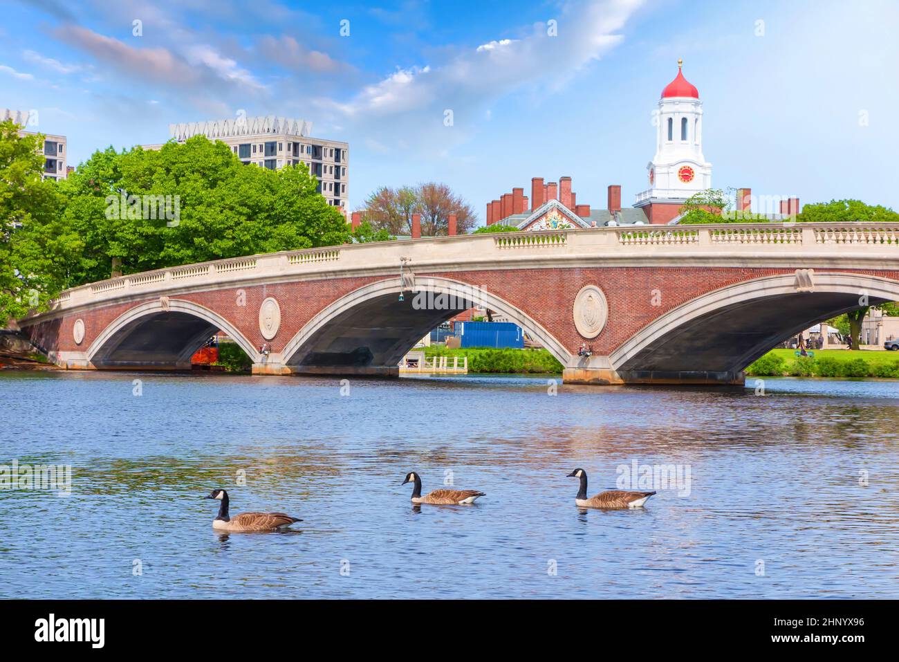 Vintage Bridge with clock tower over Charles River Boston ...