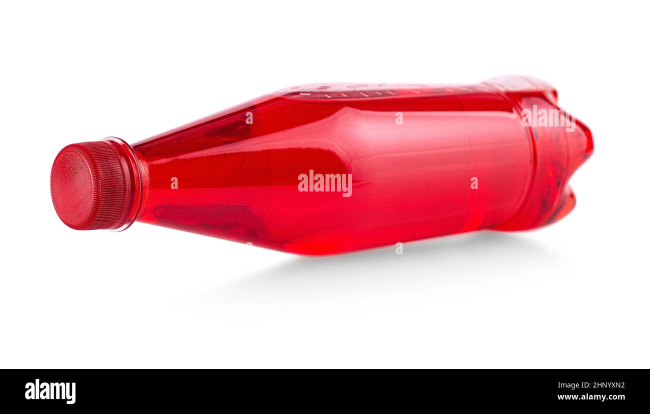 The red plastic bottle with juice isolated on white background Stock ...