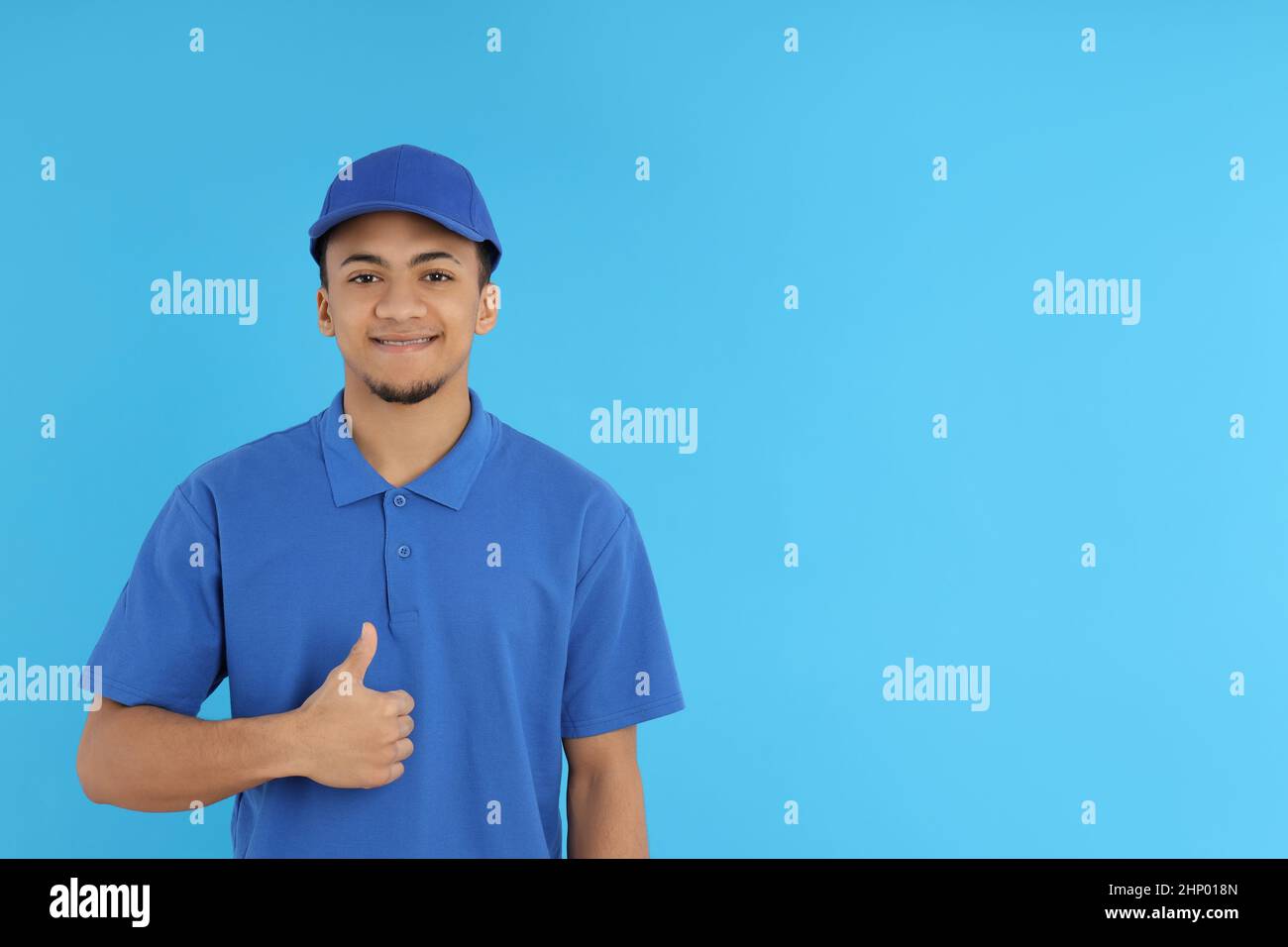 Man in blue cap grey hi-res stock photography and images - Alamy