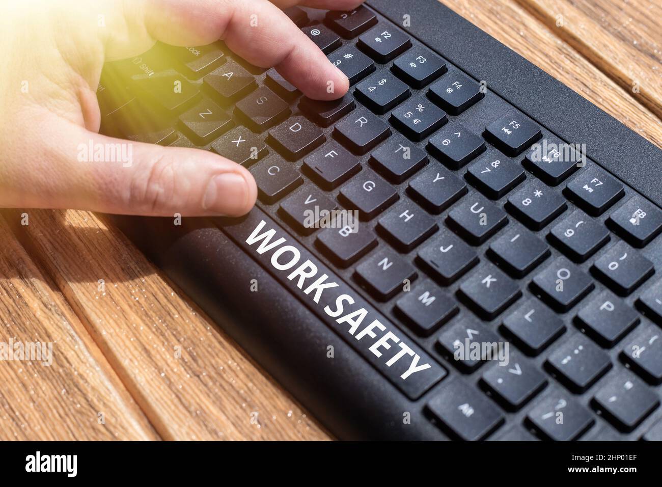 Sign displaying Work Safety, Business approach policies and procedures ...