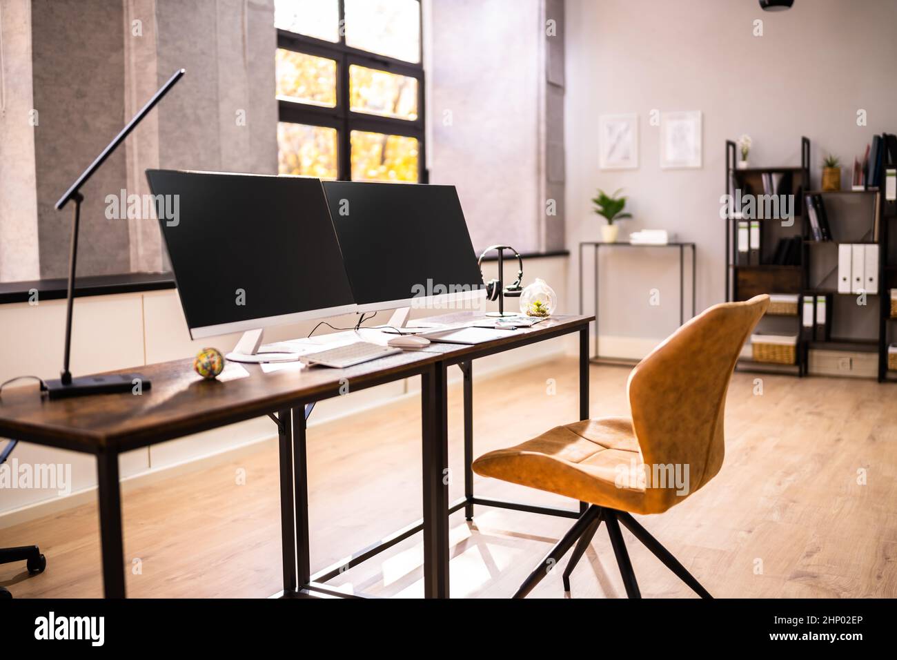 Office Room With Multiple Computer Monitors On Desk Stock Photo - Alamy