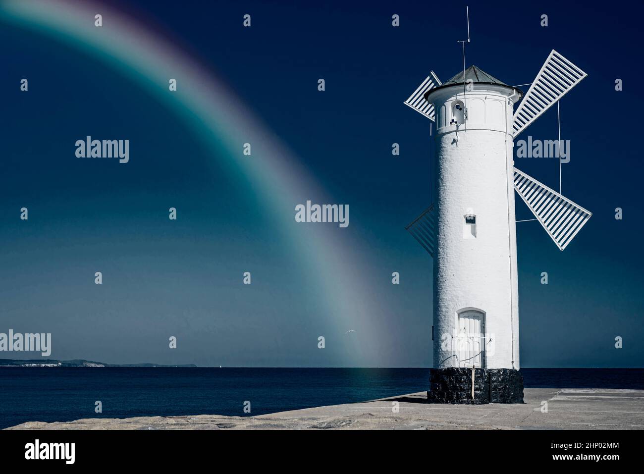 Swinoujscie, town's landmark with rainbow in infrared Stock Photo - Alamy