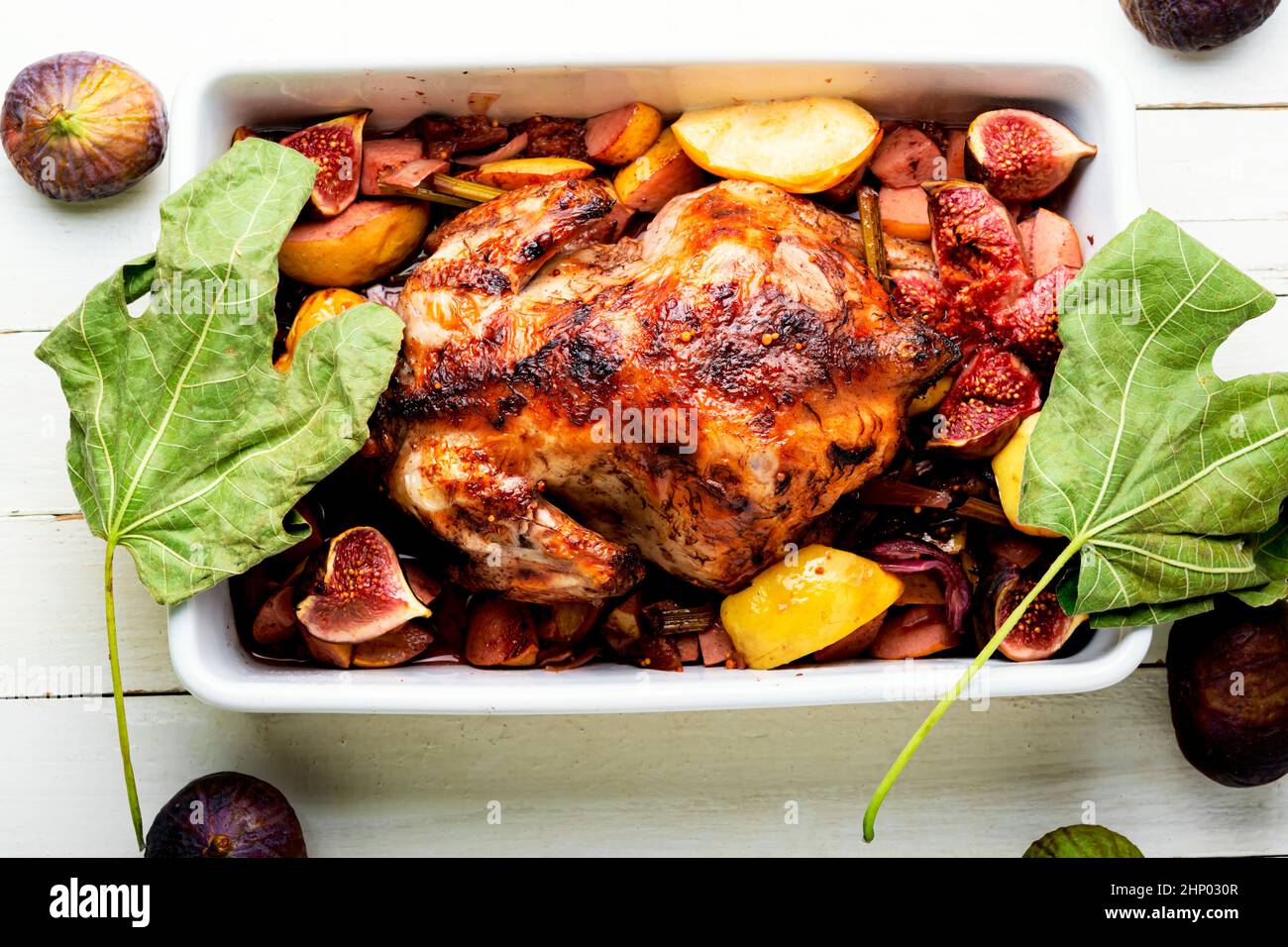 Tasty whole hen meat in a baking dish. Barbecued chicken Stock Photo ...