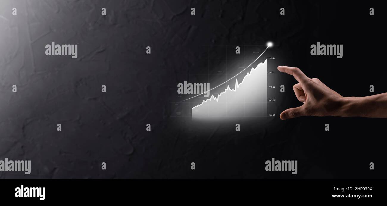 Businessman holding graph growth and increase of chart positive ...