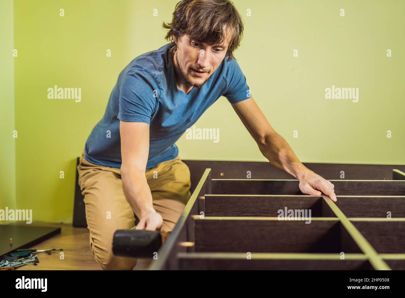 Frustrated Man Putting Together Self Assembly Furniture Stock Photo - Alamy