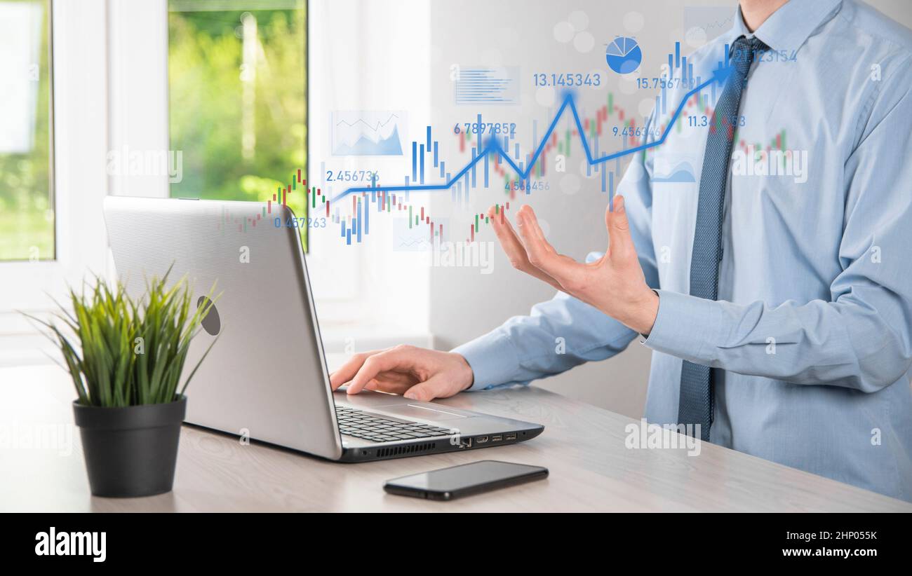 Businessman in hand hold banking business finance graph and invest in ...