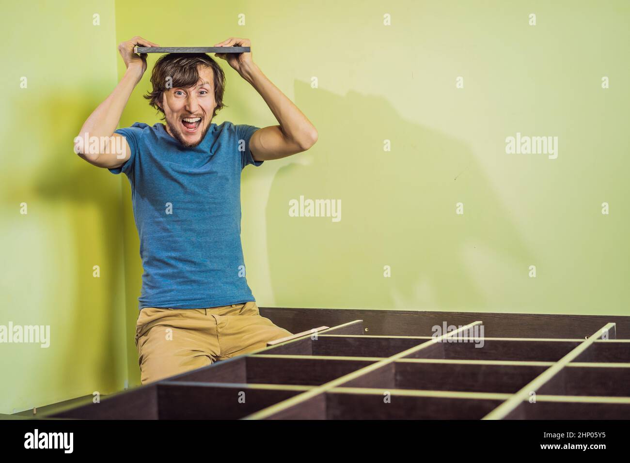 Frustrated Man Putting Together Self Assembly Furniture Stock Photo - Alamy