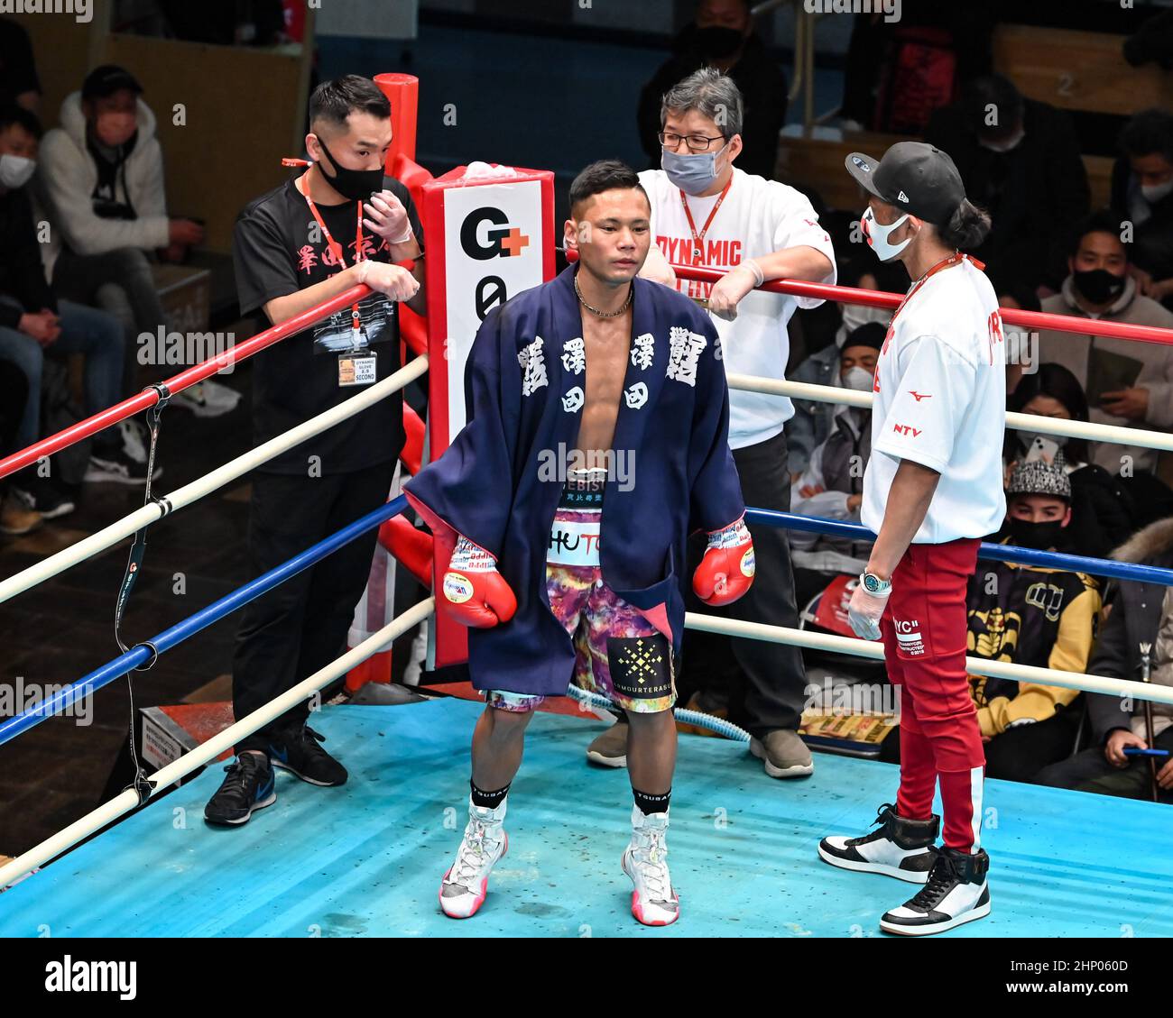 Kyosuke Sawada, second left, stands with JB Sports Boxing Gym chairman Joji Morikawa, second ...