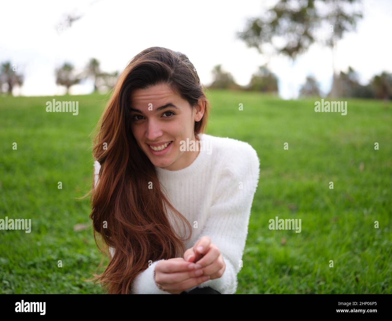 Girl looks shyly into the camera hi-res stock photography and images ...