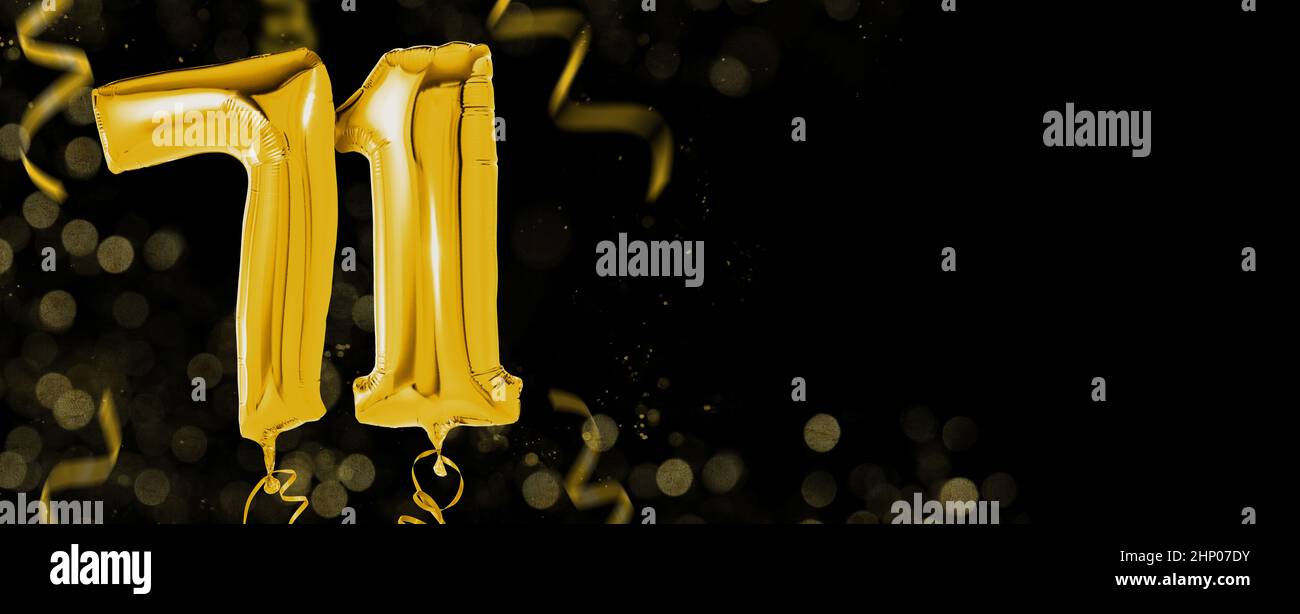 Golden balloons with copy space - Number 71 Stock Photo - Alamy