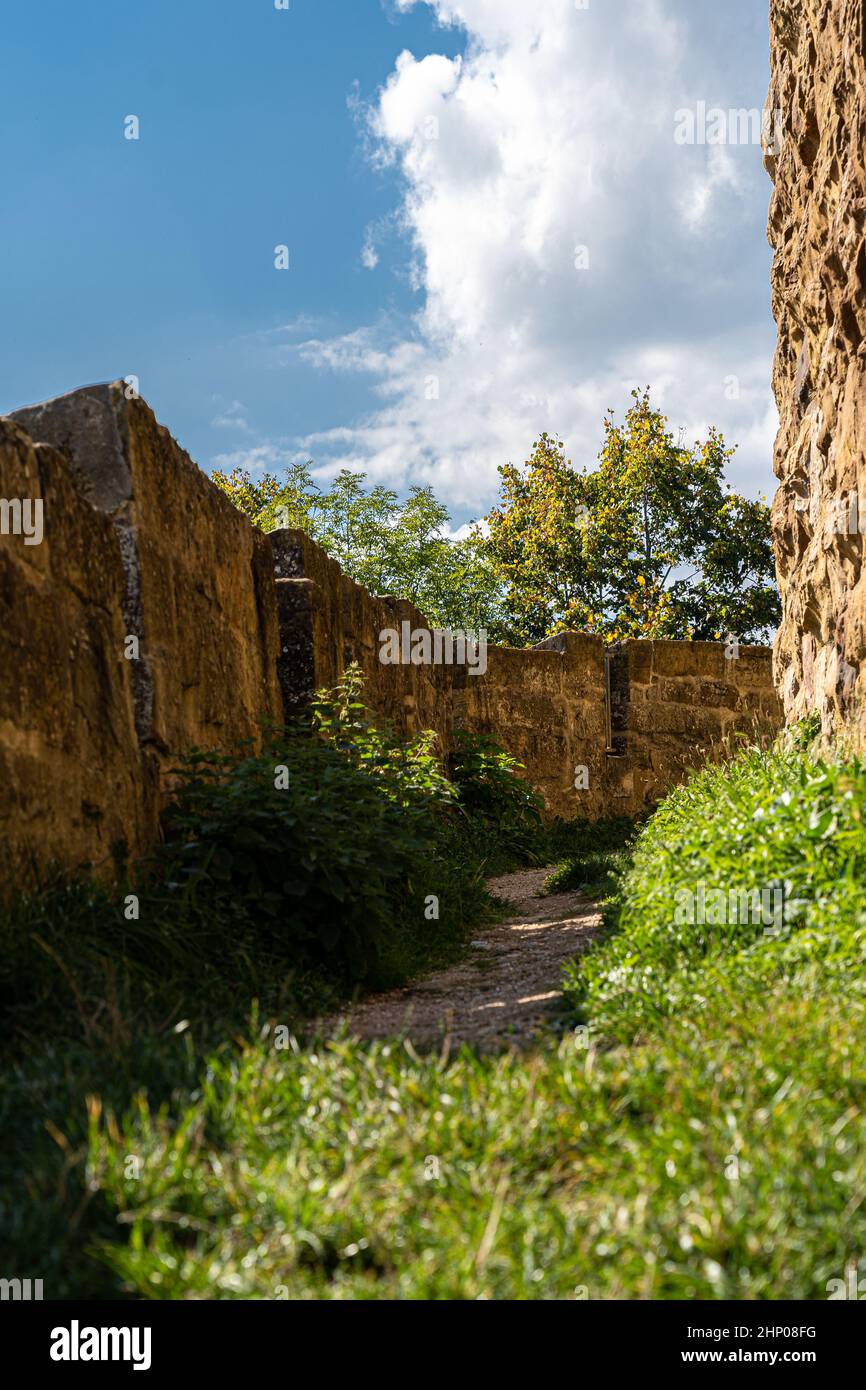 Massive high walls of an old medieval castle Stock Photo - Alamy