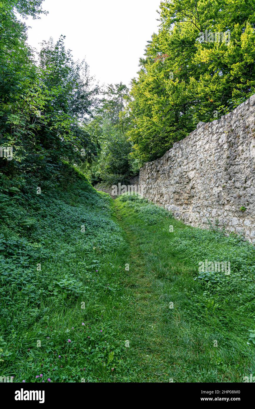 Massive high walls of an old medieval castle Stock Photo - Alamy