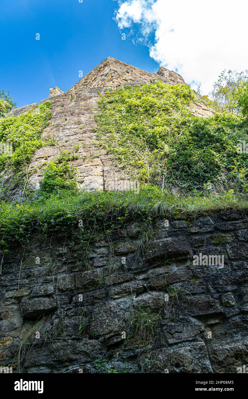 Massive high walls of an old medieval castle Stock Photo - Alamy