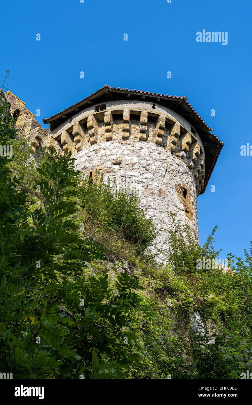 Massive high walls and a tower of an old medieval castle Stock Photo ...