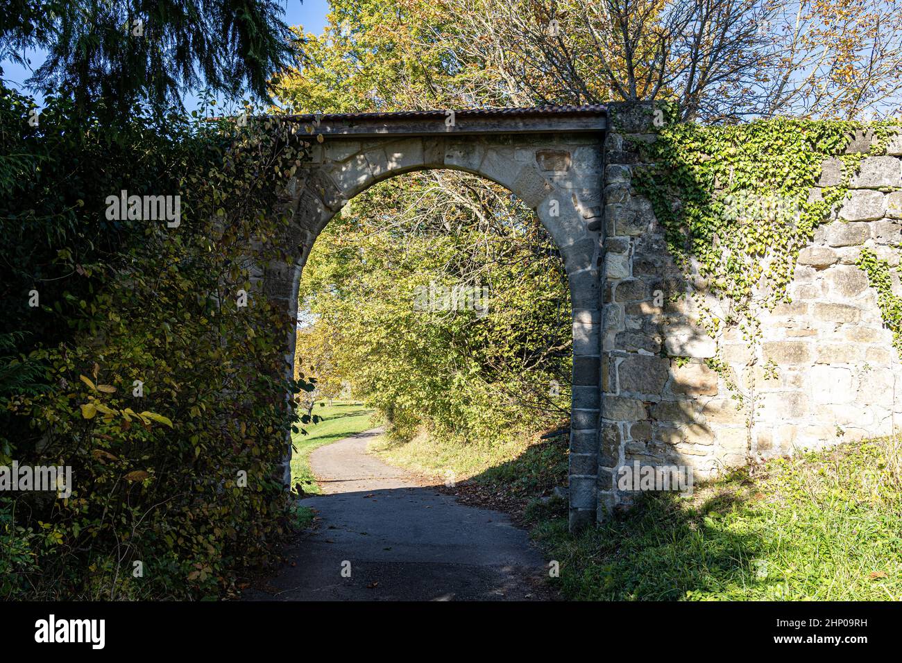 Inside the walls of an old cloister with big gate Stock Photo - Alamy