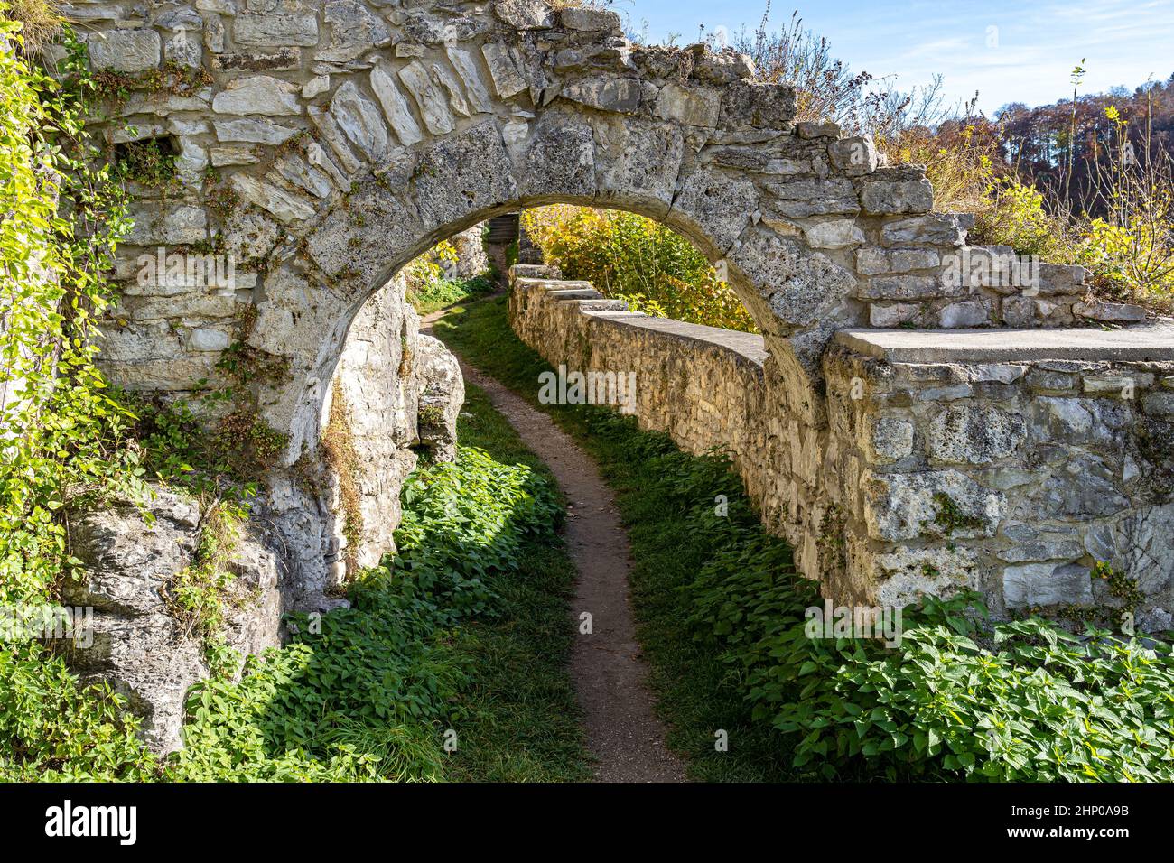 Big walls of an old castle ruin and a high gate made of stone Stock ...