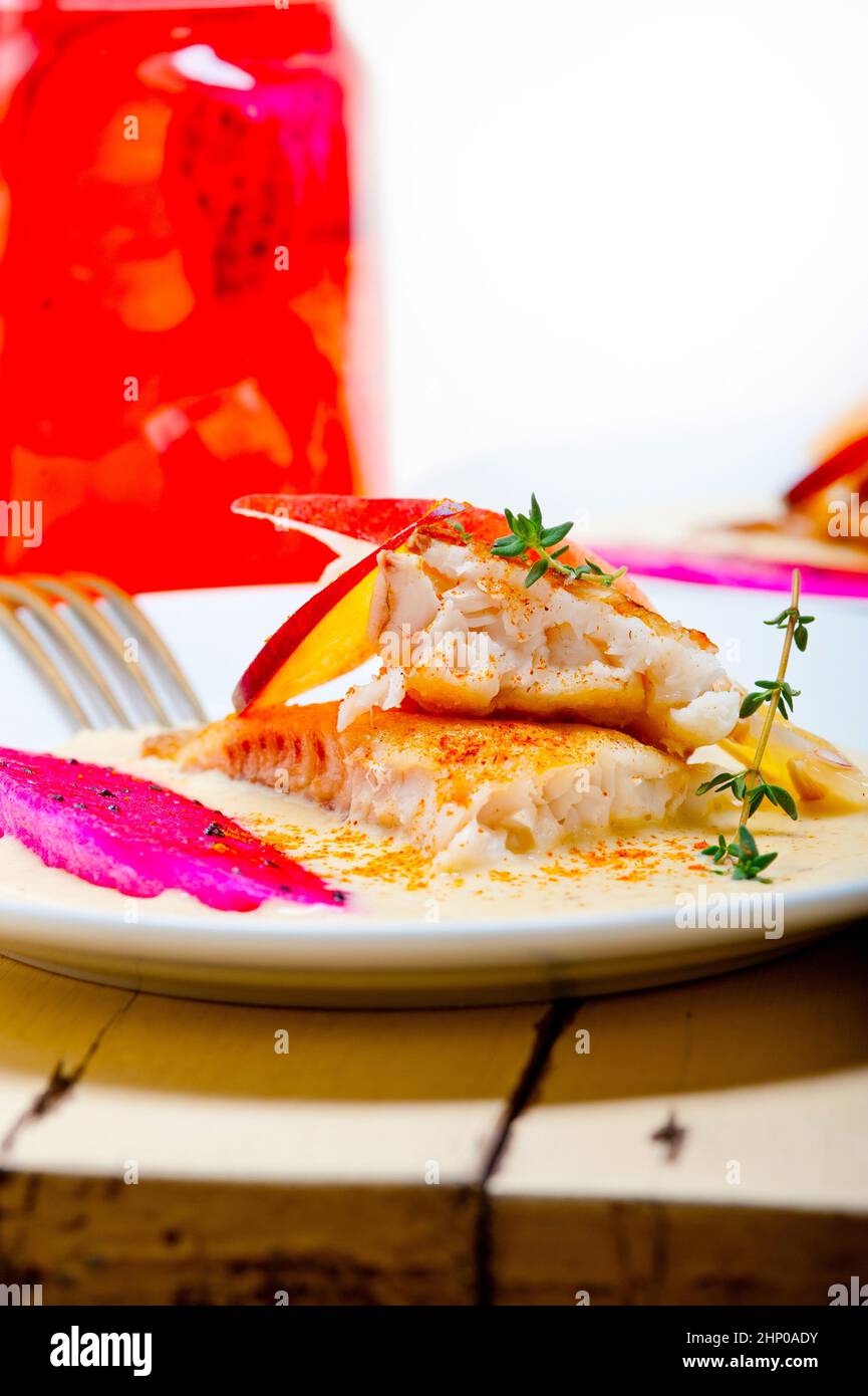 sea bream orata fillet butter pan fried with fresh peach prune and ...