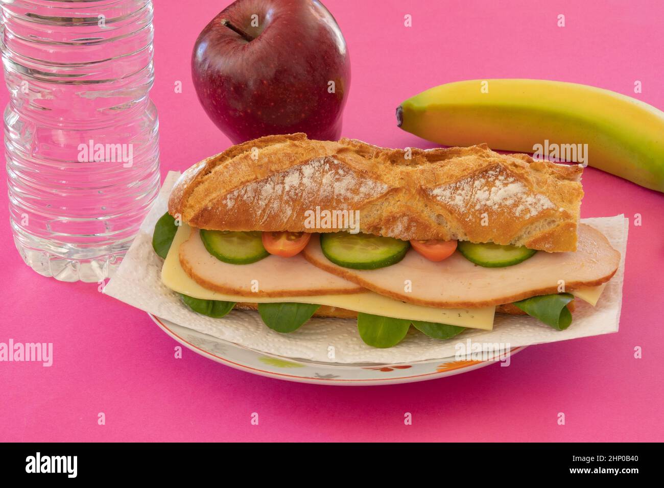 chicken fillet sandwich with fresh fruits on a pink background Stock ...