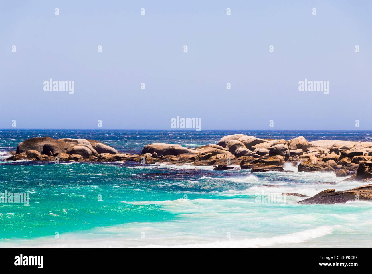 Camps Bay Beach turquoise water white sand and rocks in Cape Town ...