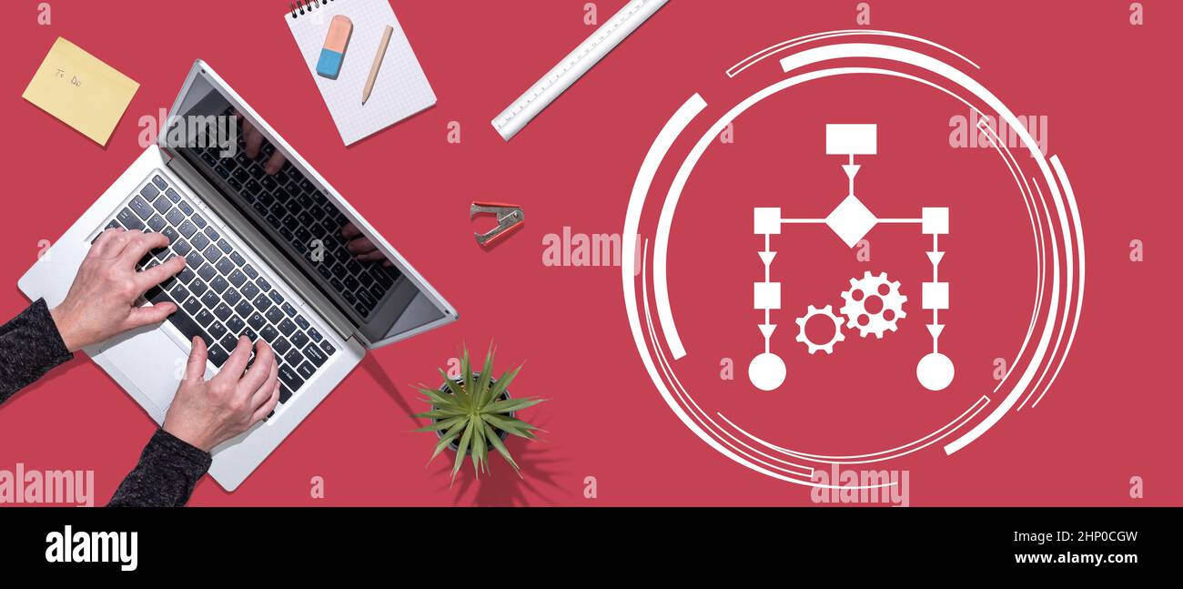Top view of hands using laptop with symbol of workflow concept Stock ...