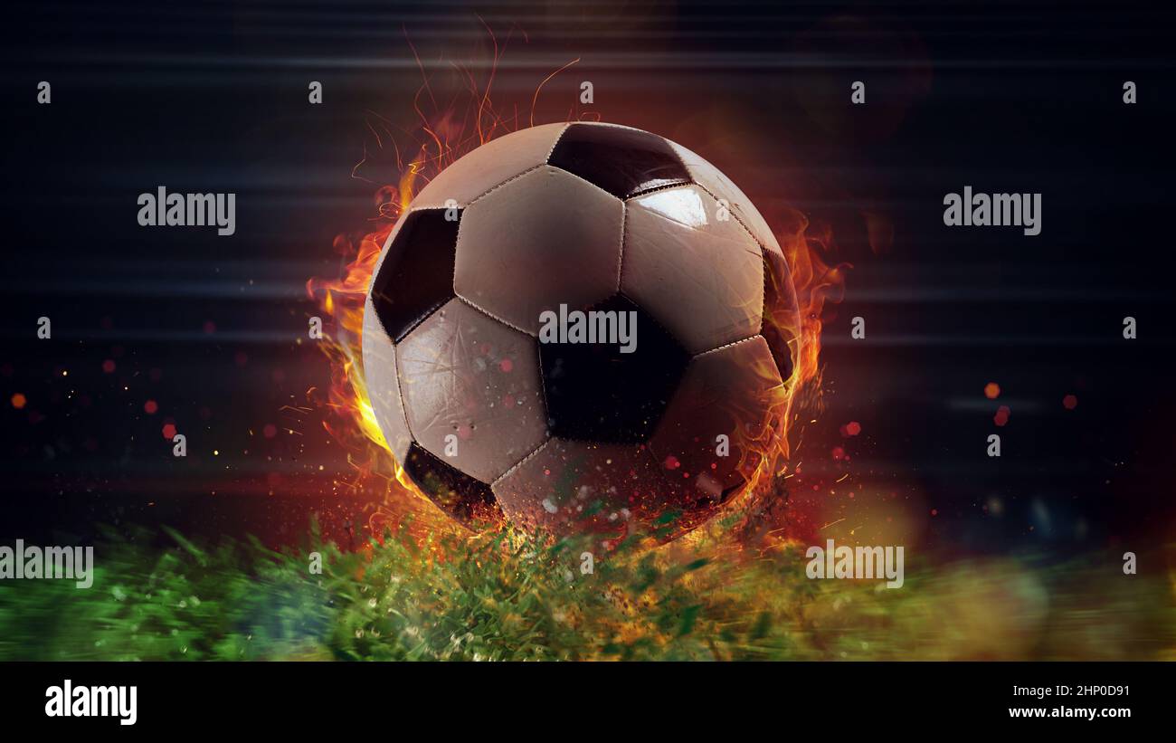 Soccer ball in flame goes fast to the stadium Stock Photo - Alamy