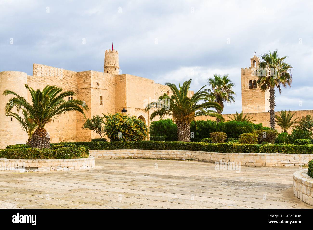 The huge, majestic walls and towers of Ribat fortress on a rainy day ...