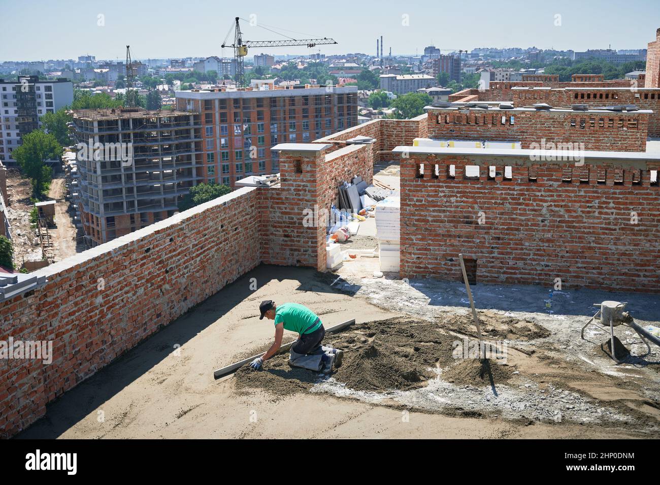 Construction site with newly built apartment buildings, tower crane and ...