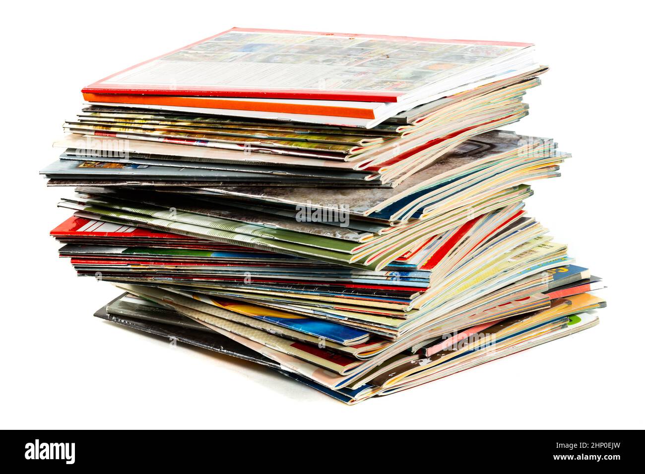 Stack of colorful magazines on light background Stock Photo - Alamy
