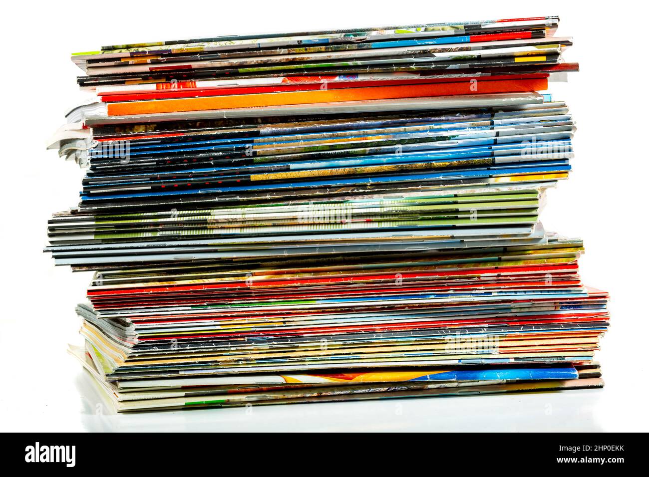Stack of colorful magazines on light background Stock Photo - Alamy
