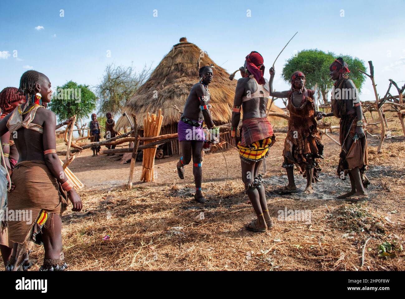 Woman whipped at Hamar tribe bull jumping ceremony. Bull jump is the ...