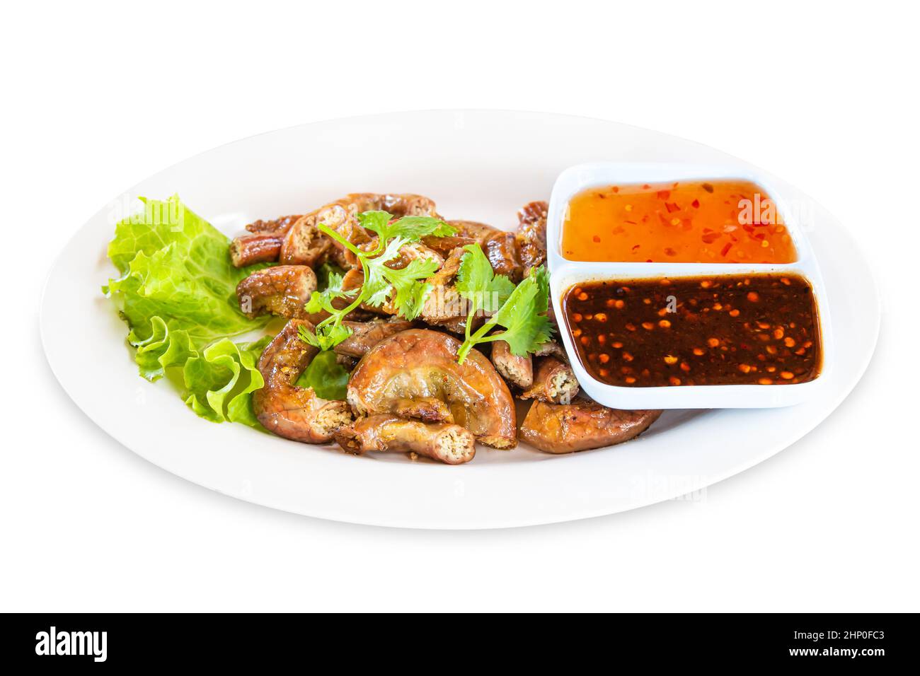 Pig's intestines grilled with sauce thai style food in dish on white ...