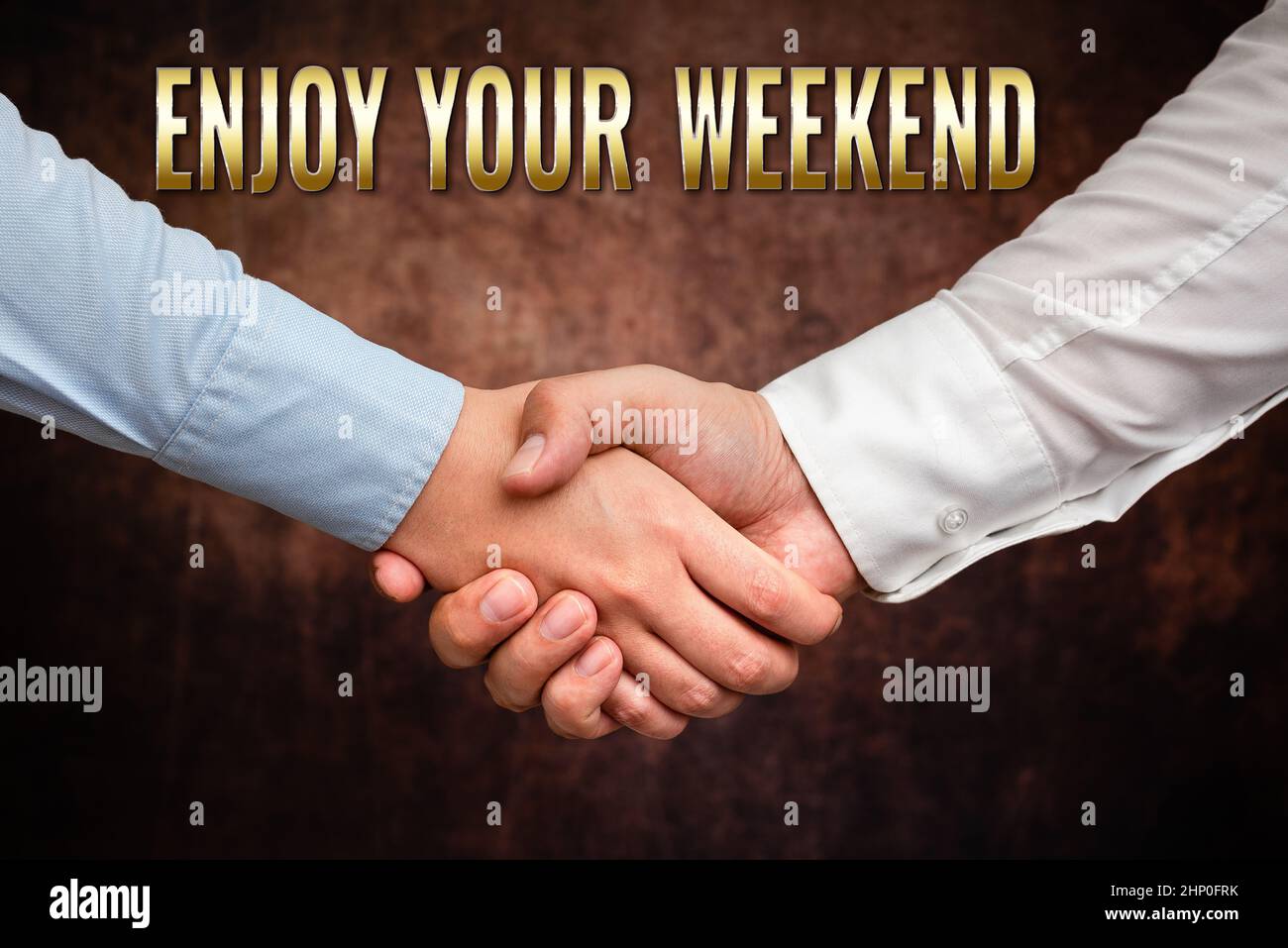 Hand writing sign Enjoy Your Weekend, Word Written on wishing someone ...