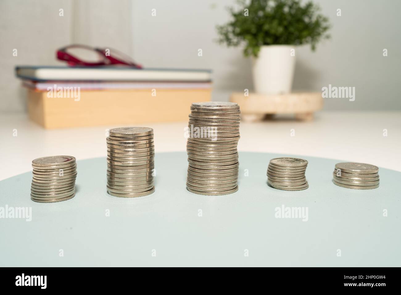 Moving over pile gold coins hi-res stock photography and images - Alamy