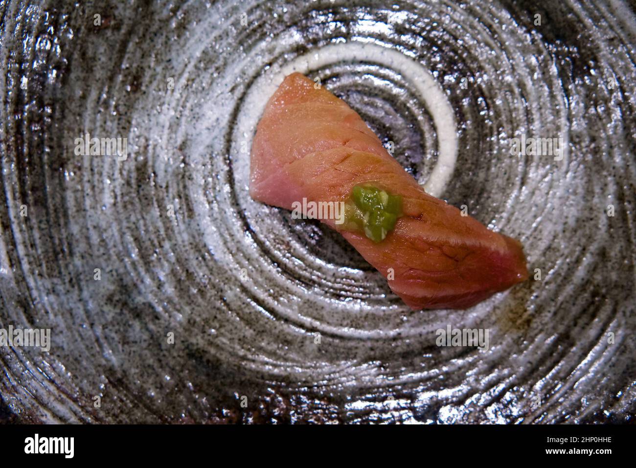 Tuna Sushi with fresh wasabi served on ceramic plate (Top View). Enjoy ...